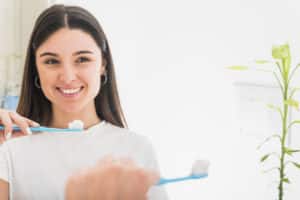 What is the ideal daily routine for oral hygiene? - Smile Solutions